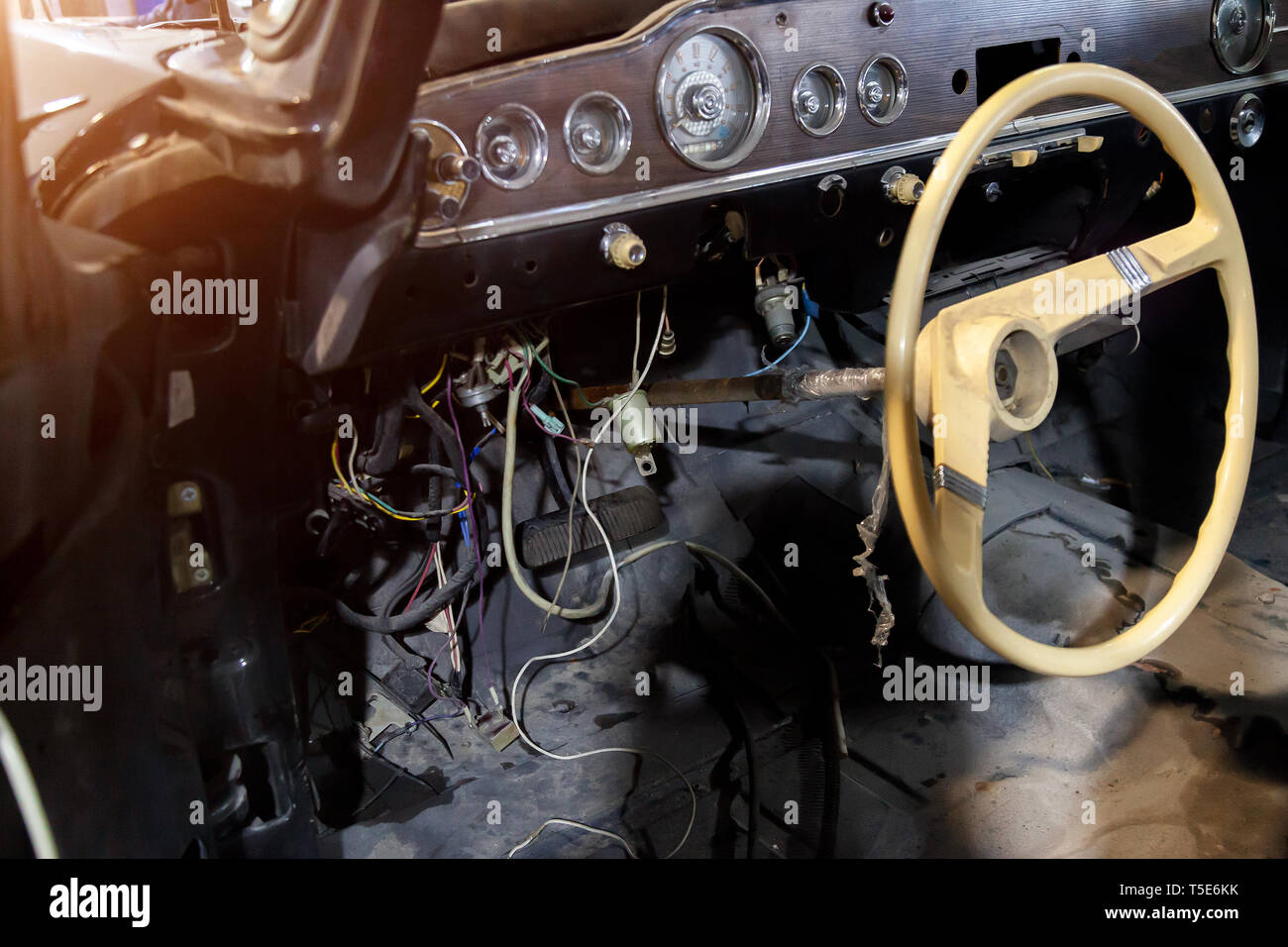 Automotive wiring under the wheel of an old russian retro car, a ...