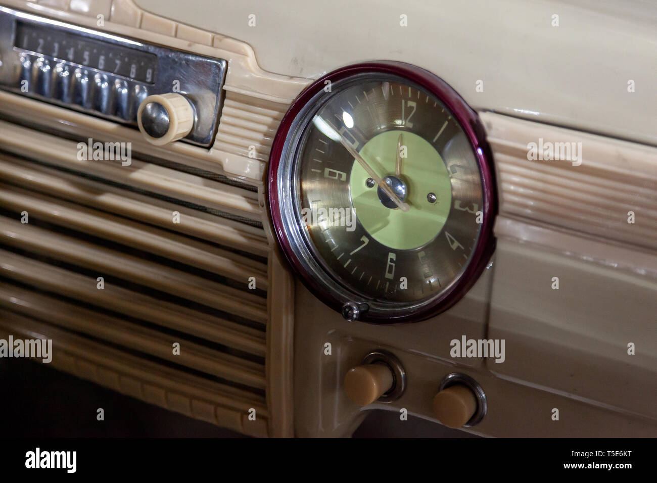Vintage retro car dashboard with analog clock and audio radio system ...