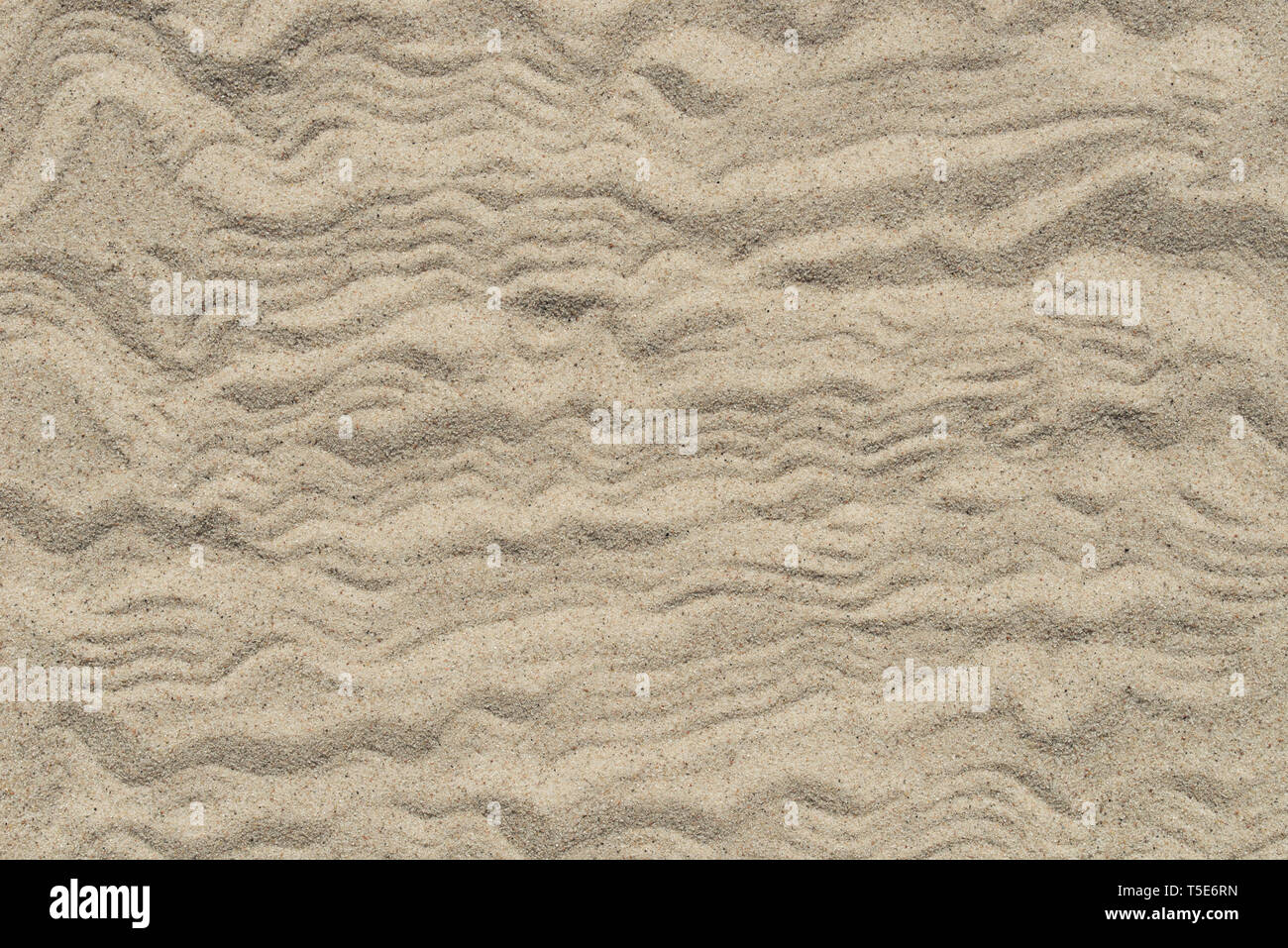 wave pattern on natural sand texture background closeup Stock Photo - Alamy