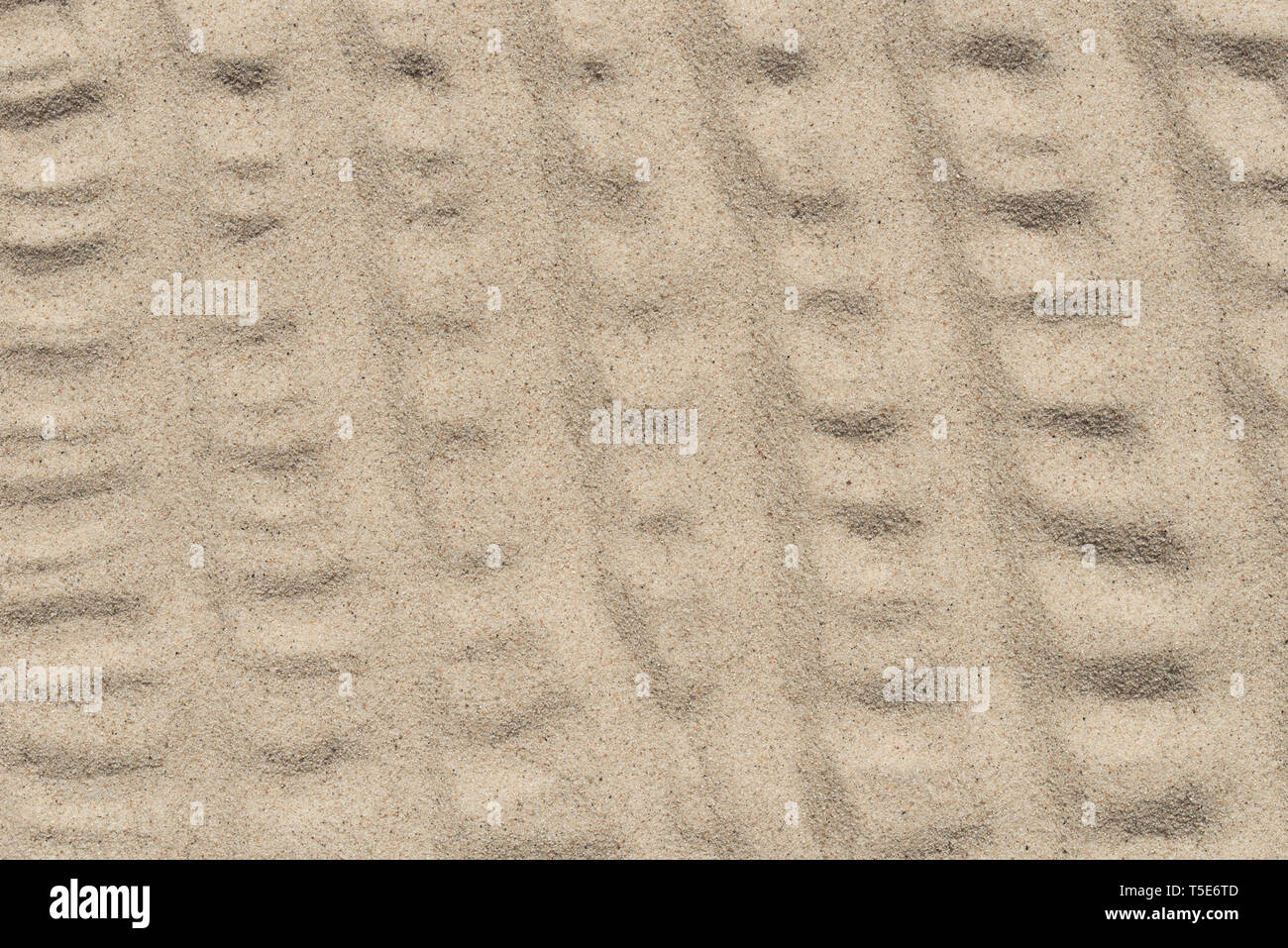 grid pattern on natural sand texture background closeup Stock Photo - Alamy