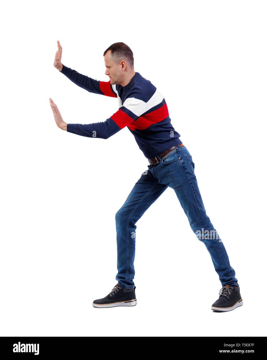 back view of man pushes wall. Isolated over white background. backside ...