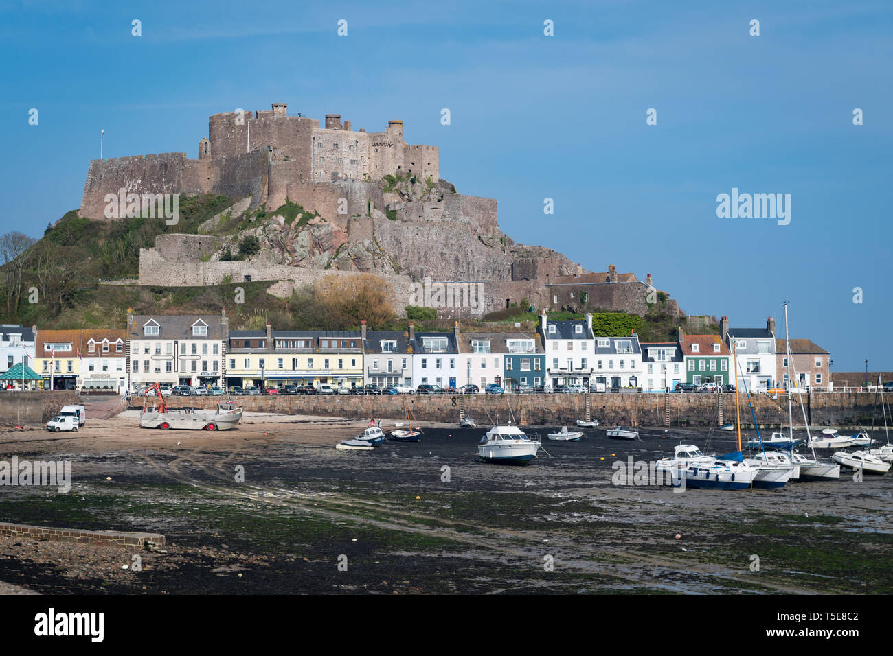 Gorey, Jersey - April 2019: Gorey Harbour and Mount Orgeuil castle ...