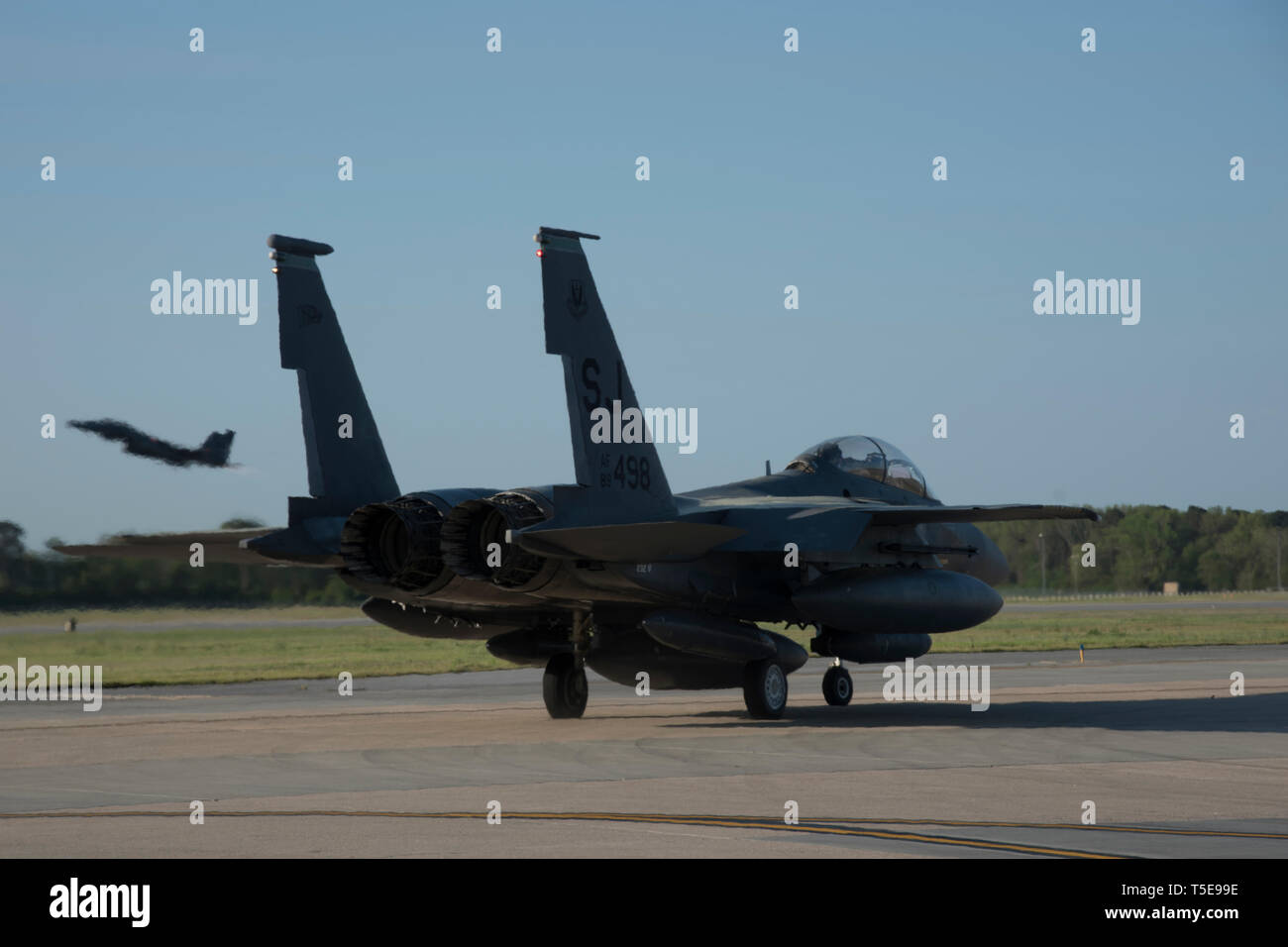An F-15E Strike Eagle assigned to the 335th Fighter Squadron taxis down ...