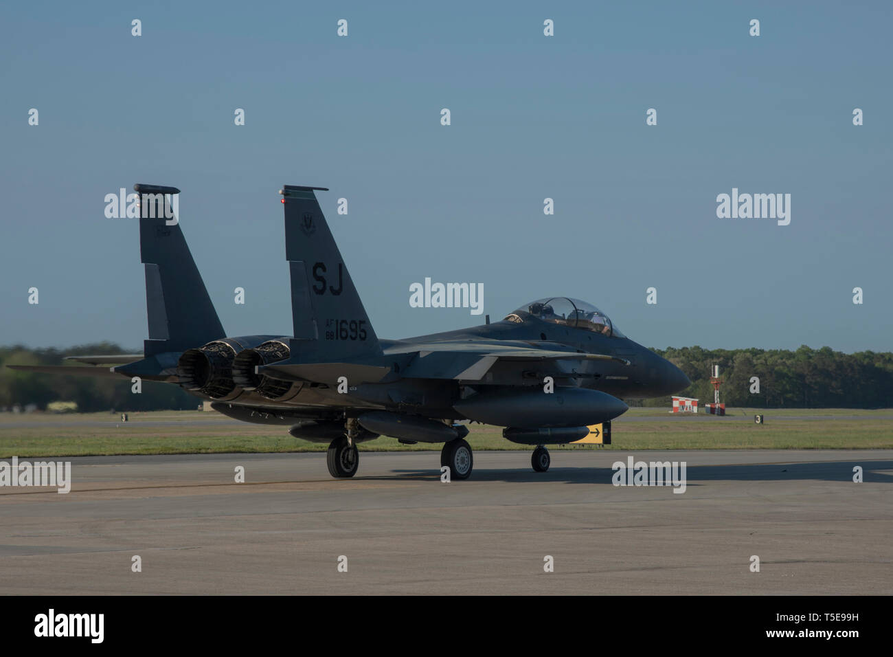 An F-15E Strike Eagle assigned to the 335th Fighter Squadron taxis down ...