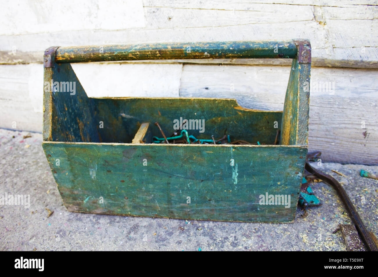Wooden box with old rusty nails Stock Photo - Alamy