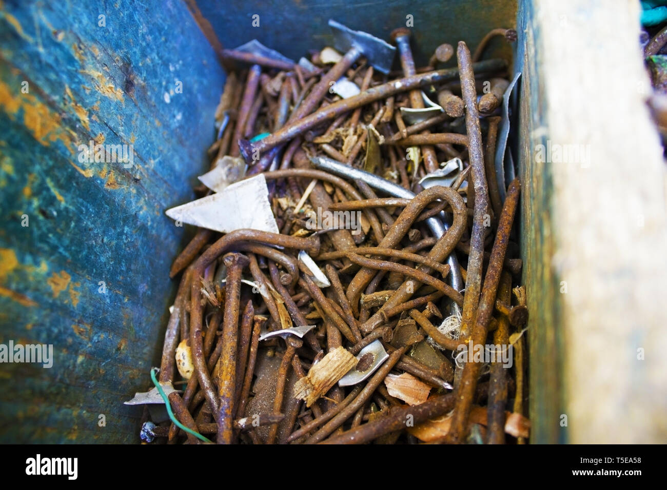 Wooden box with old rusty nails Stock Photo - Alamy