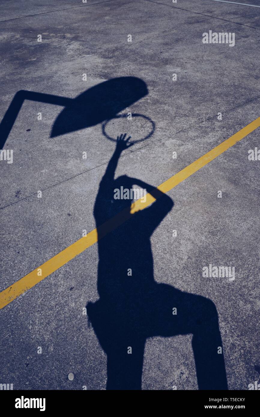 man shadow silhouette on the ground on the street Stock Photo - Alamy