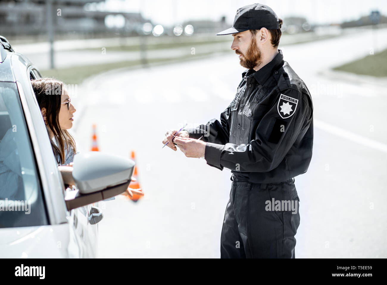 Crime policeman uniform roadside hi-res stock photography and images ...