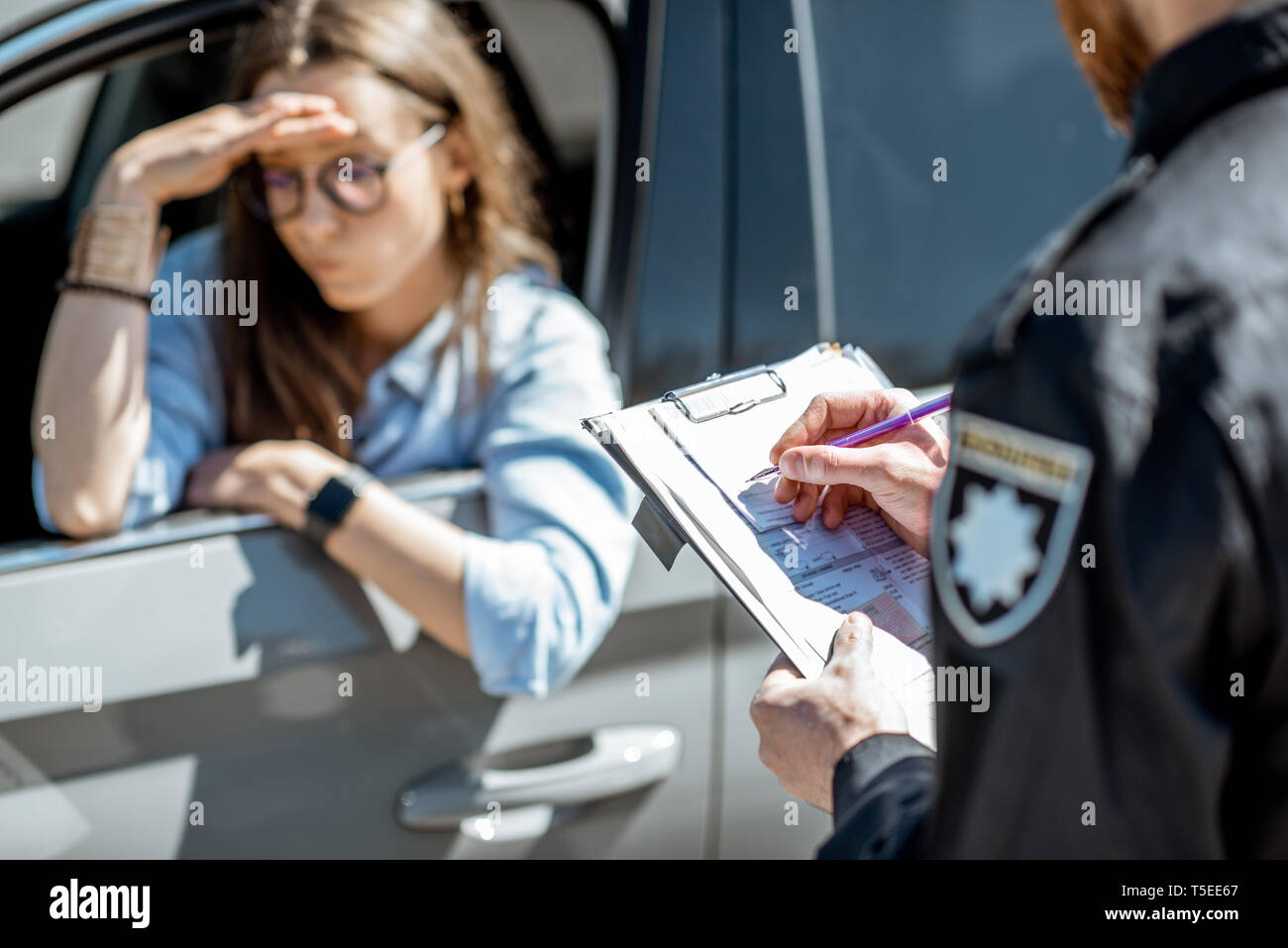 Issuing traffic offense ticket hi-res stock photography and images - Alamy