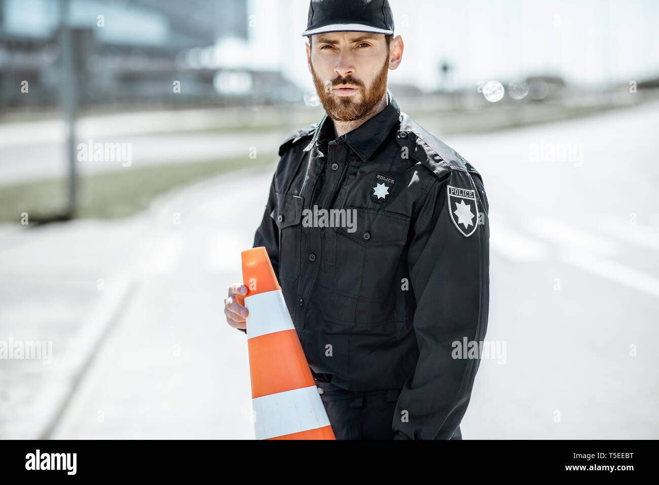 Traffic cone and man hi-res stock photography and images - Alamy