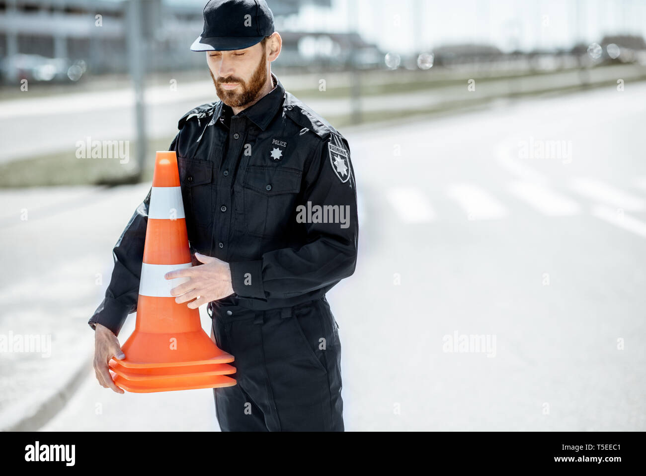 Man with traffic cone hi-res stock photography and images - Alamy