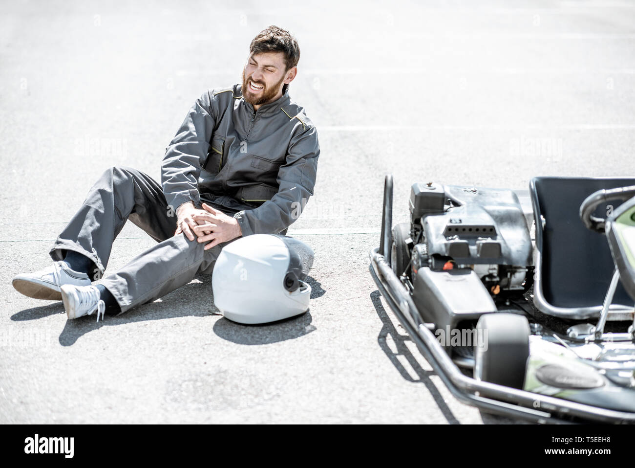 Racer lying on the track with serious injury after the accident during ...