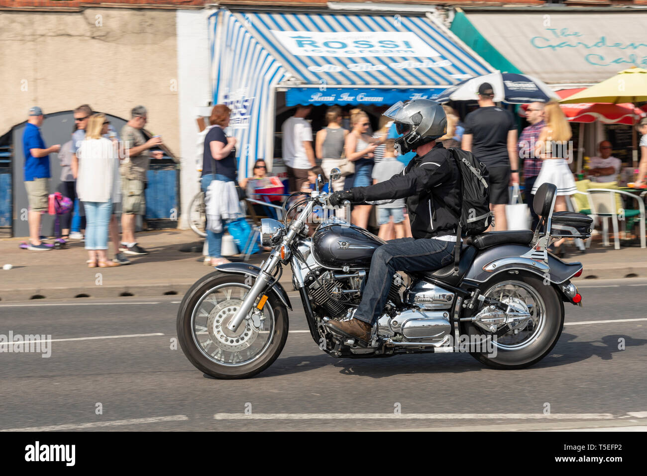 Yamaha Star cruiser motorbike ridden past arches cafes at the Southend ...