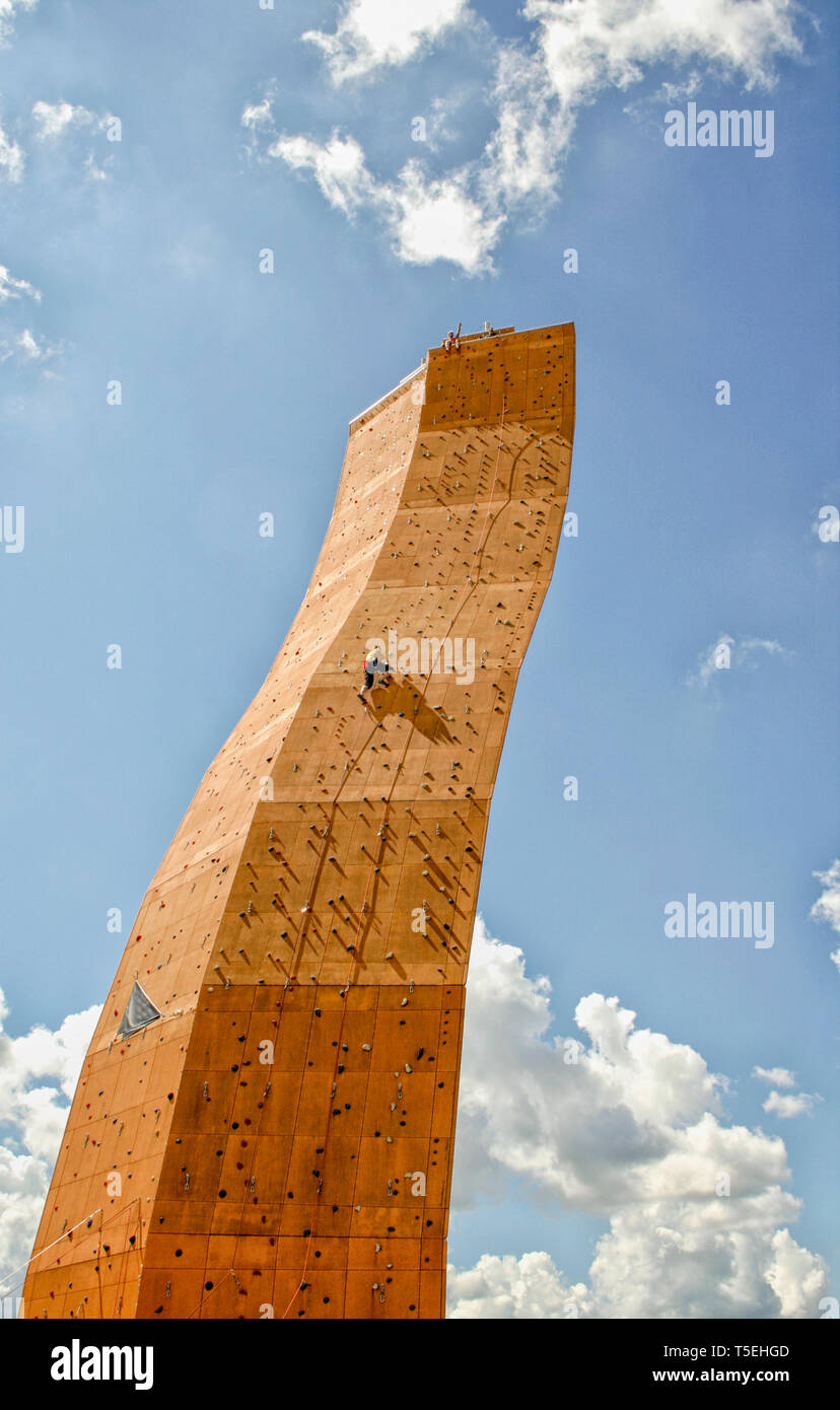 Man on a climbing wall Stock Photo - Alamy