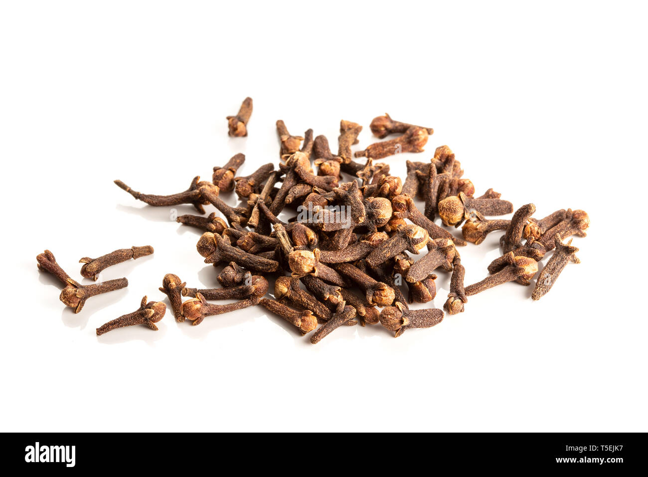 Pile of spice cloves isolated on white background. Syzygium aromaticum ...