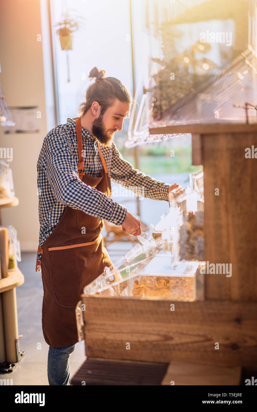 Filling food containers hi-res stock photography and images - Alamy