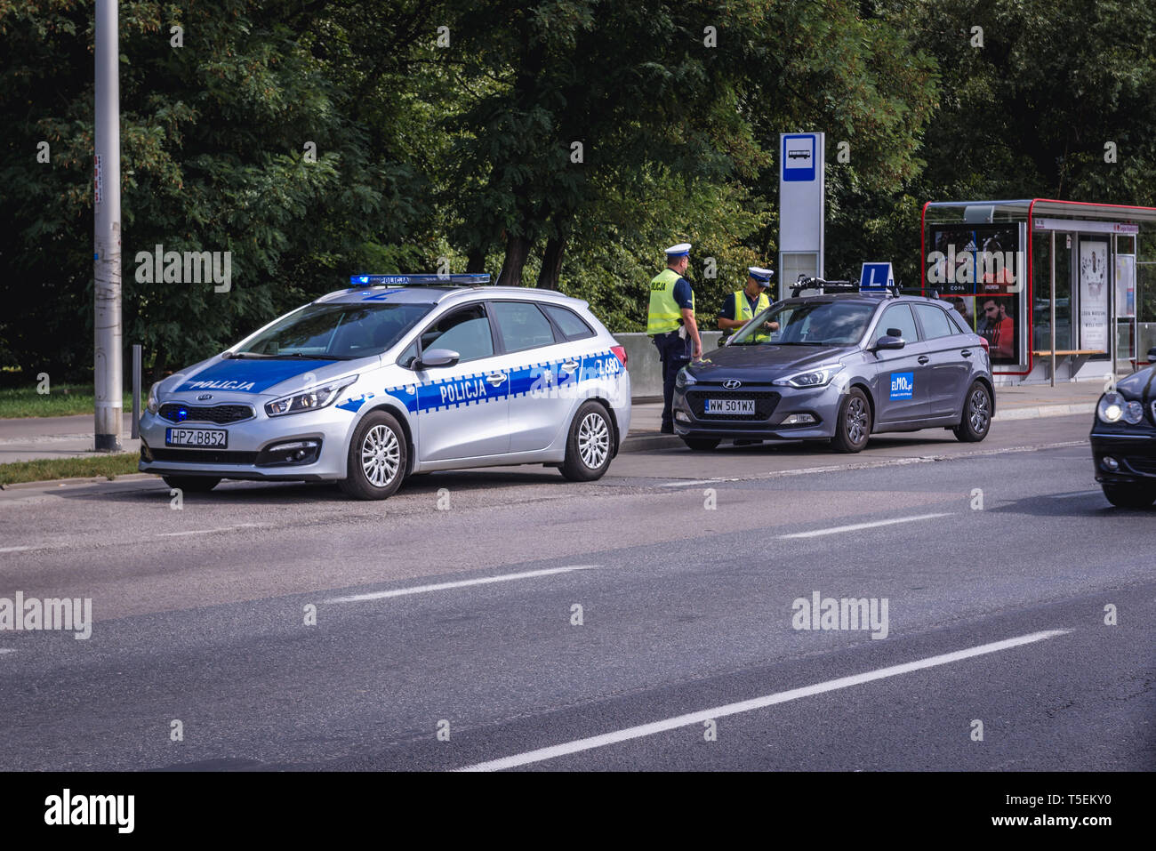 Road traffic police control in Warsaw, Poland Stock Photo - Alamy