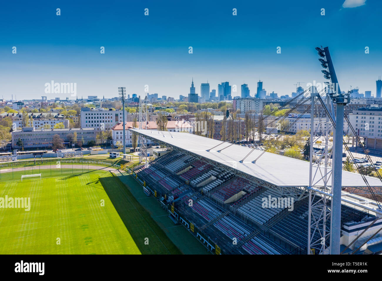 Aerial view of a football field captured by drone. Stadium lights Stock ...