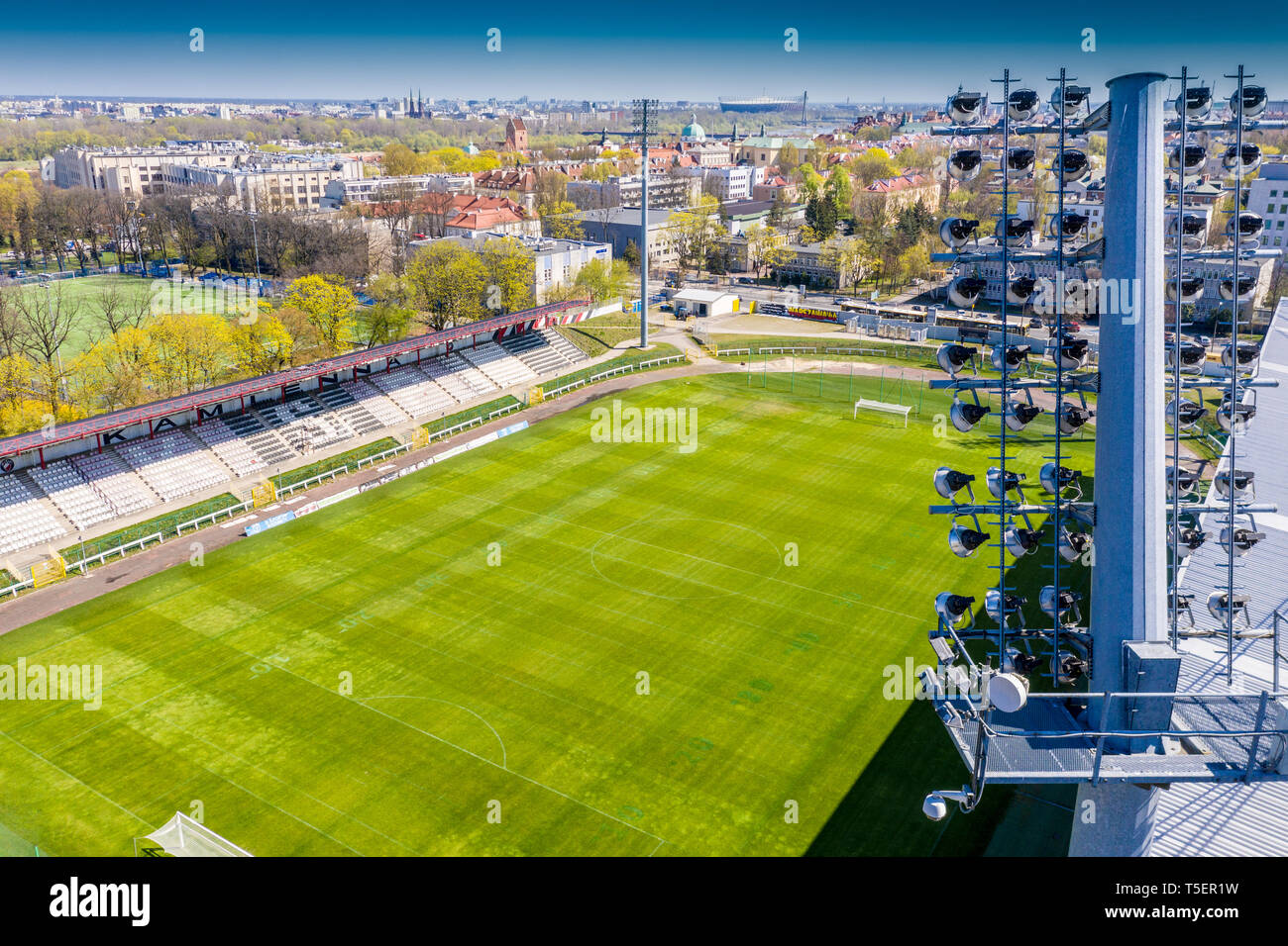Aerial view of a football field captured by drone. Stadium lights Stock ...