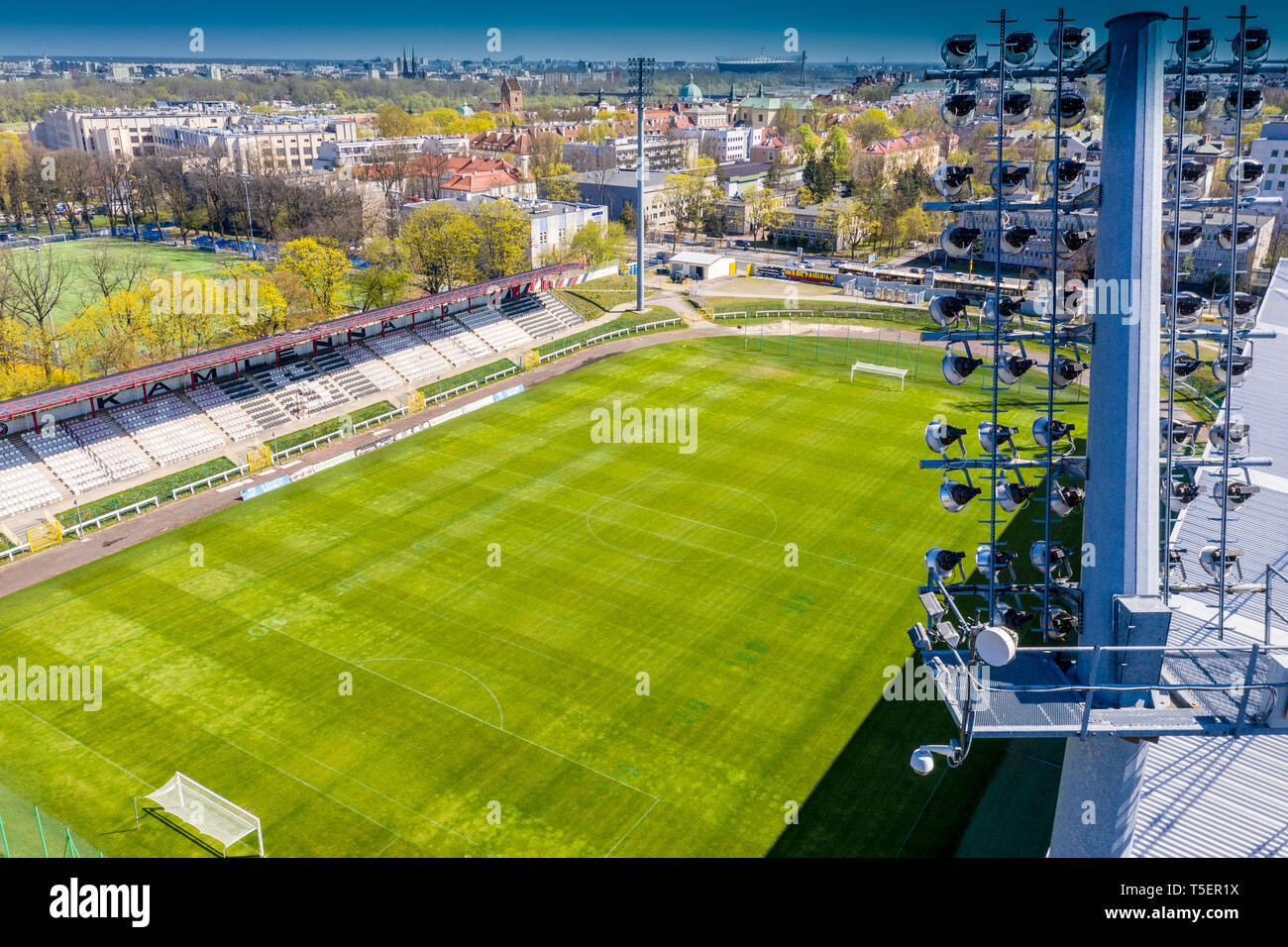 Aerial view of a football field captured by drone. Stadium lights Stock ...