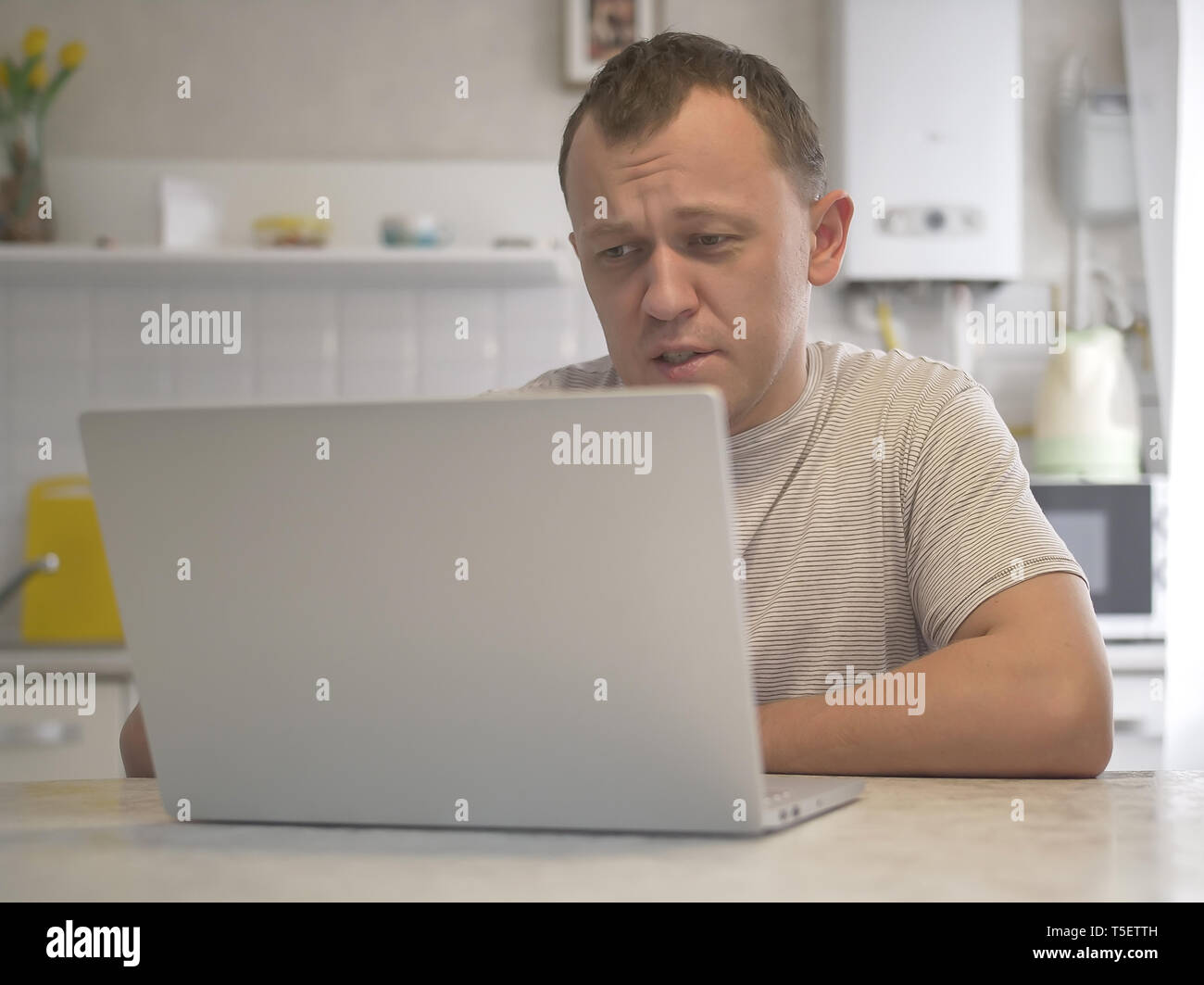 Smart guy with a laptop hi-res stock photography and images - Alamy