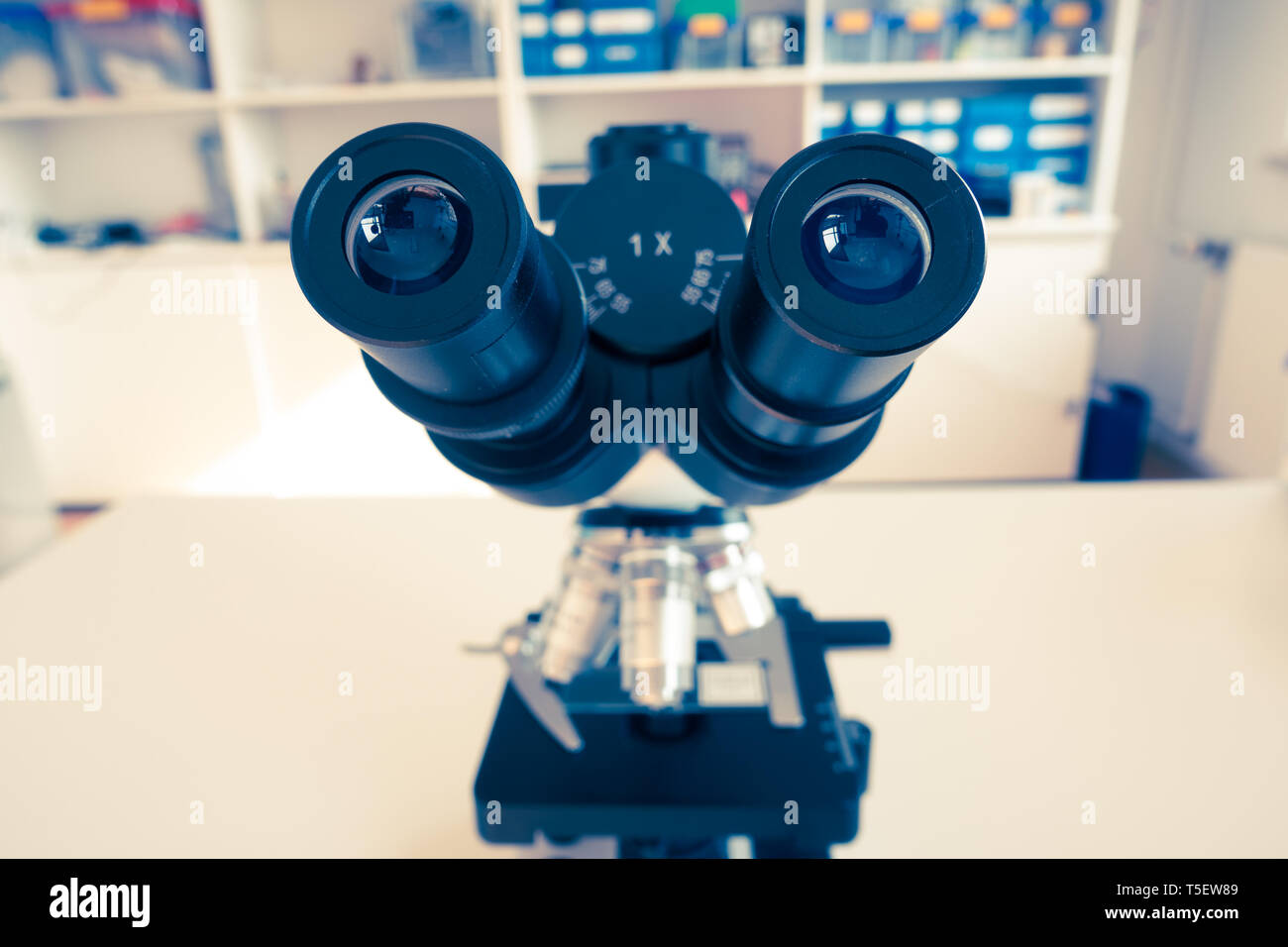 Laboratory microscope with blurred background Stock Photo - Alamy