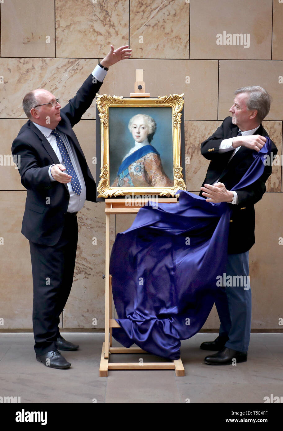 Curator David Forsyth (left) and owner Peter Pininiski unveil a ...