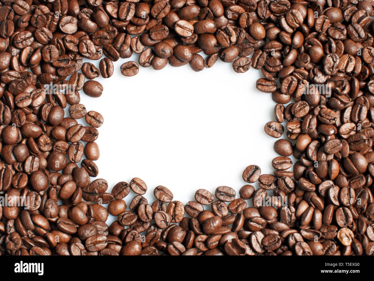 Roasted coffee beans frame on white Stock Photo - Alamy