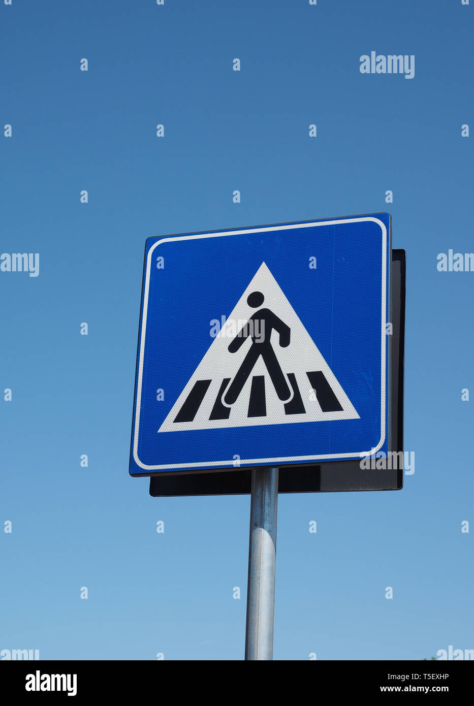 Warning signs, zebra crossing traffic sign over blue sky Stock Photo ...