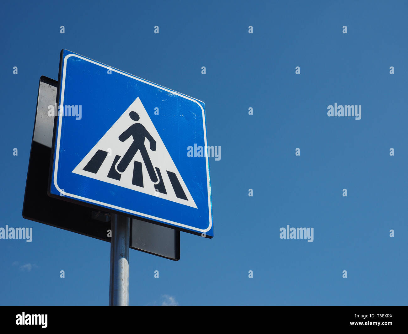 Warning signs, zebra crossing traffic sign over blue sky Stock Photo ...
