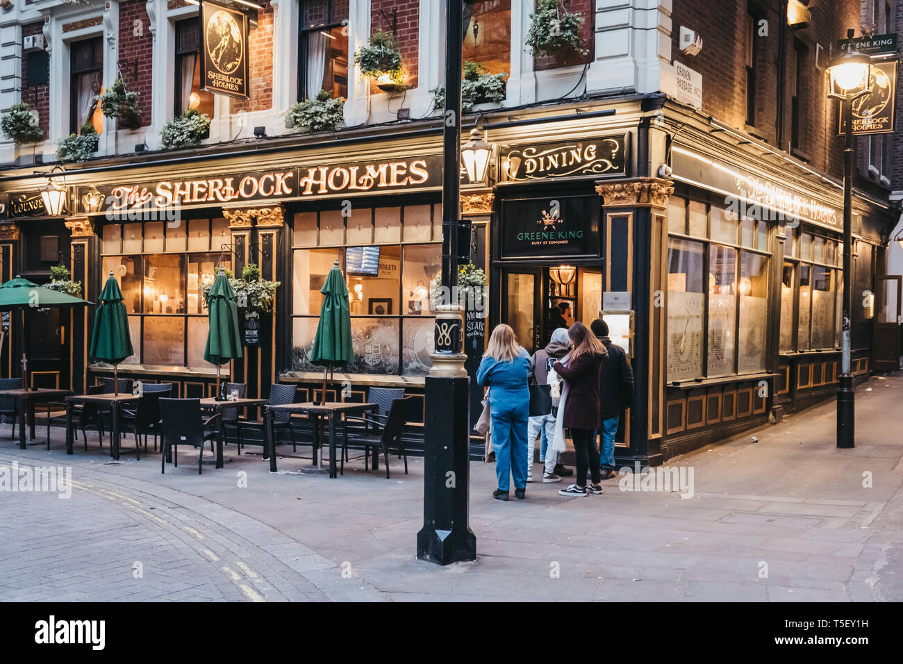 London, UK - April 13, 2019: People entering Sherlock Holmes pub in ...