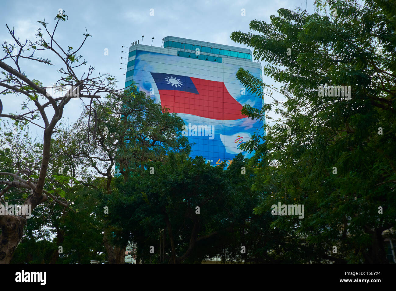 A huge flag of Taiwan covers a bank building in Kaohsiung Stock Photo ...