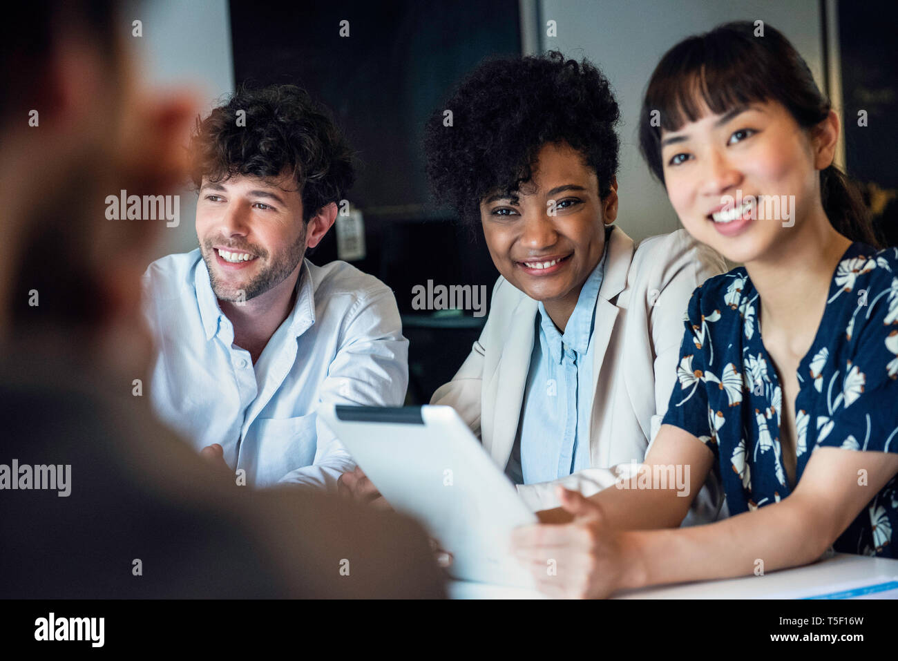 Communication smiling sitting document hi-res stock photography and ...