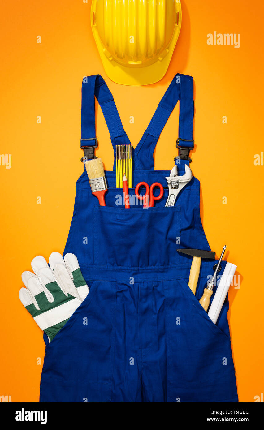 Repairman work uniform with tools and hardhat, DIY and home renovation ...