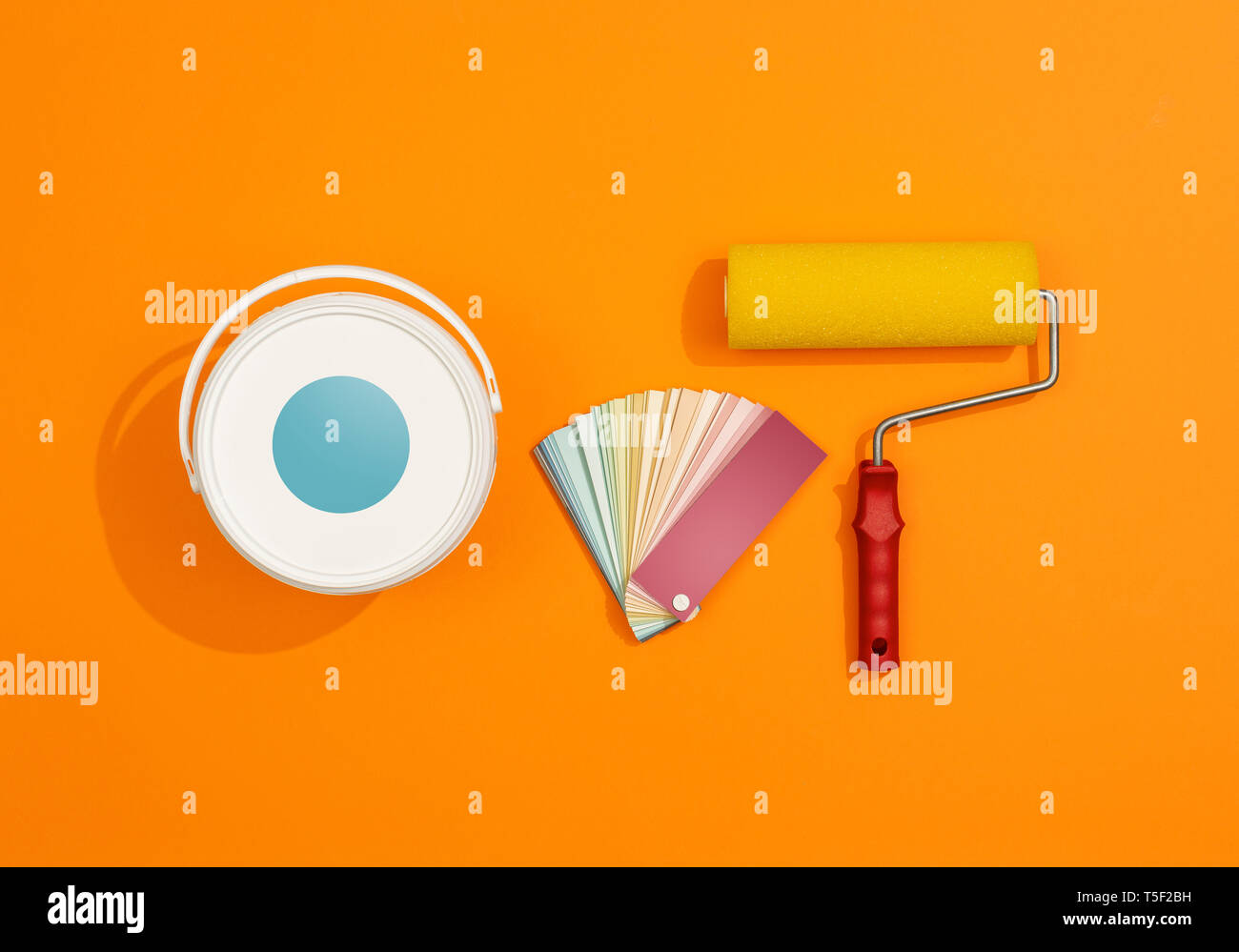 Professional painter work tools on orange background: home renovation ...
