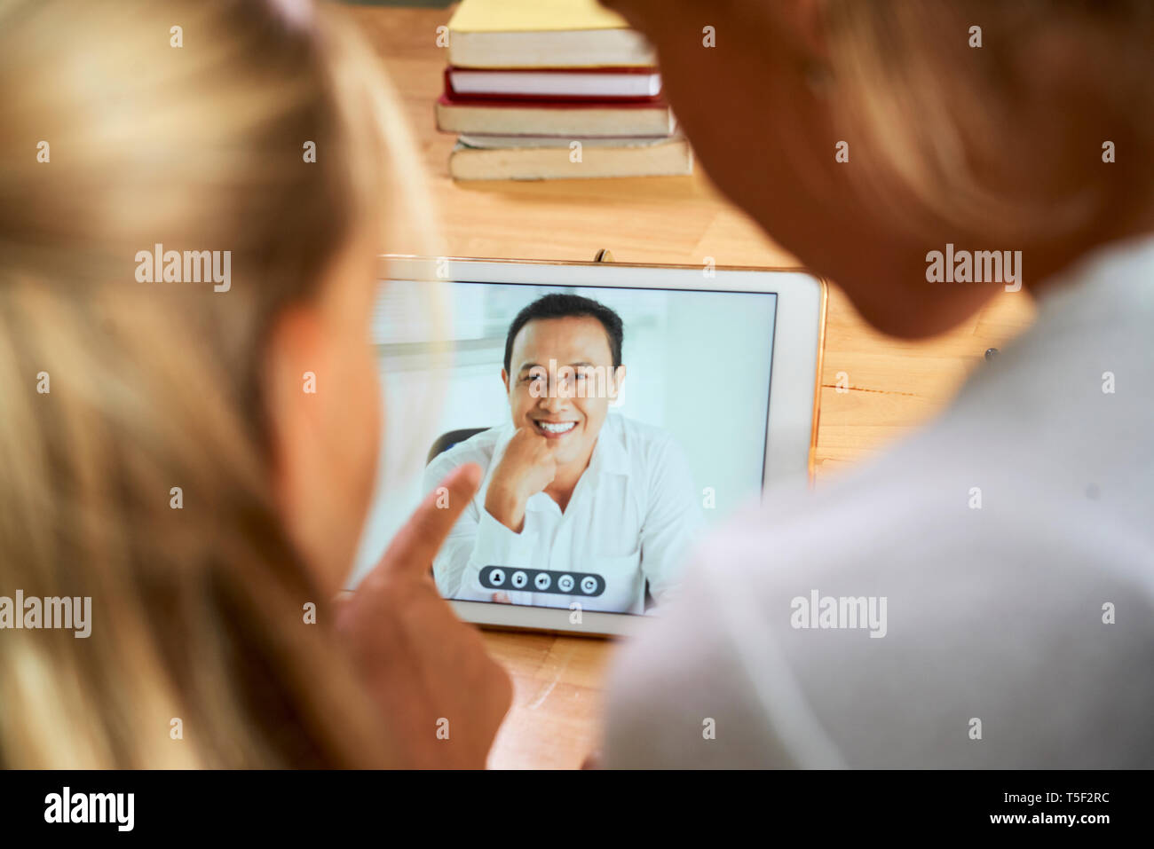 Woman video calling family hi-res stock photography and images - Alamy