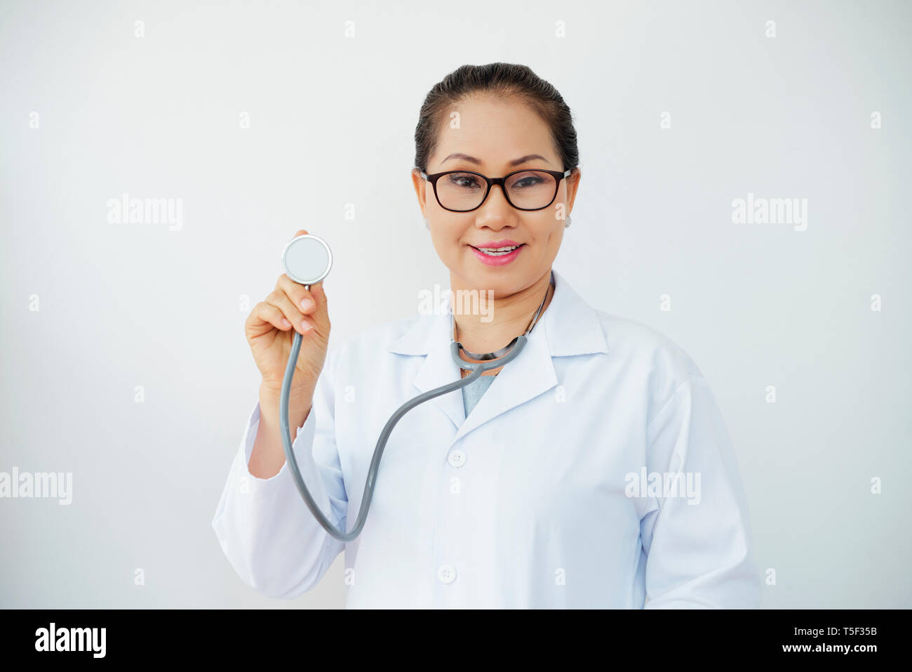 Female doctor with stethoscope Stock Photo - Alamy