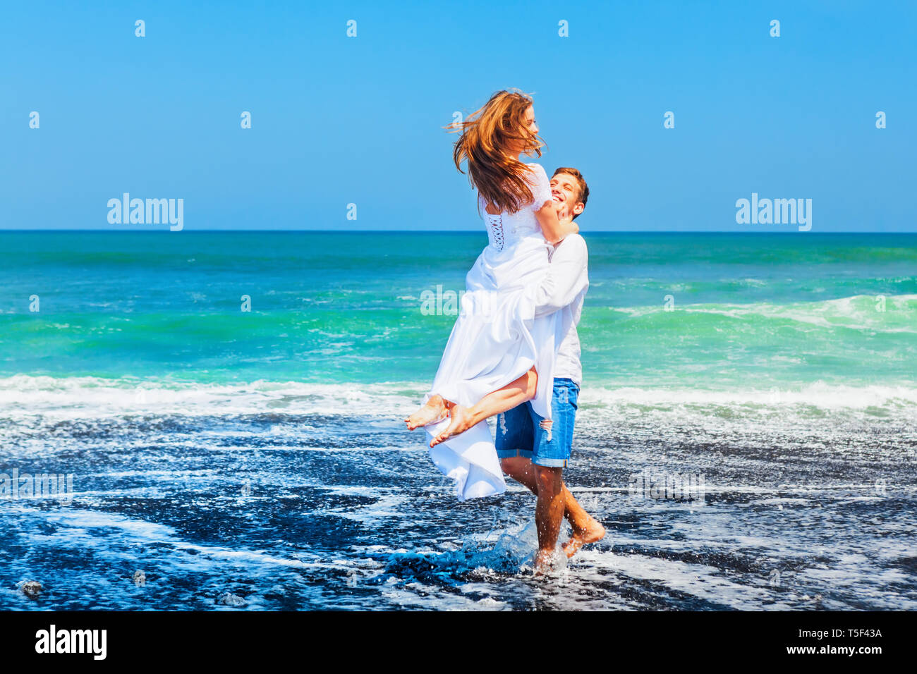 Joyful people spinning sea beach hi-res stock photography and images ...