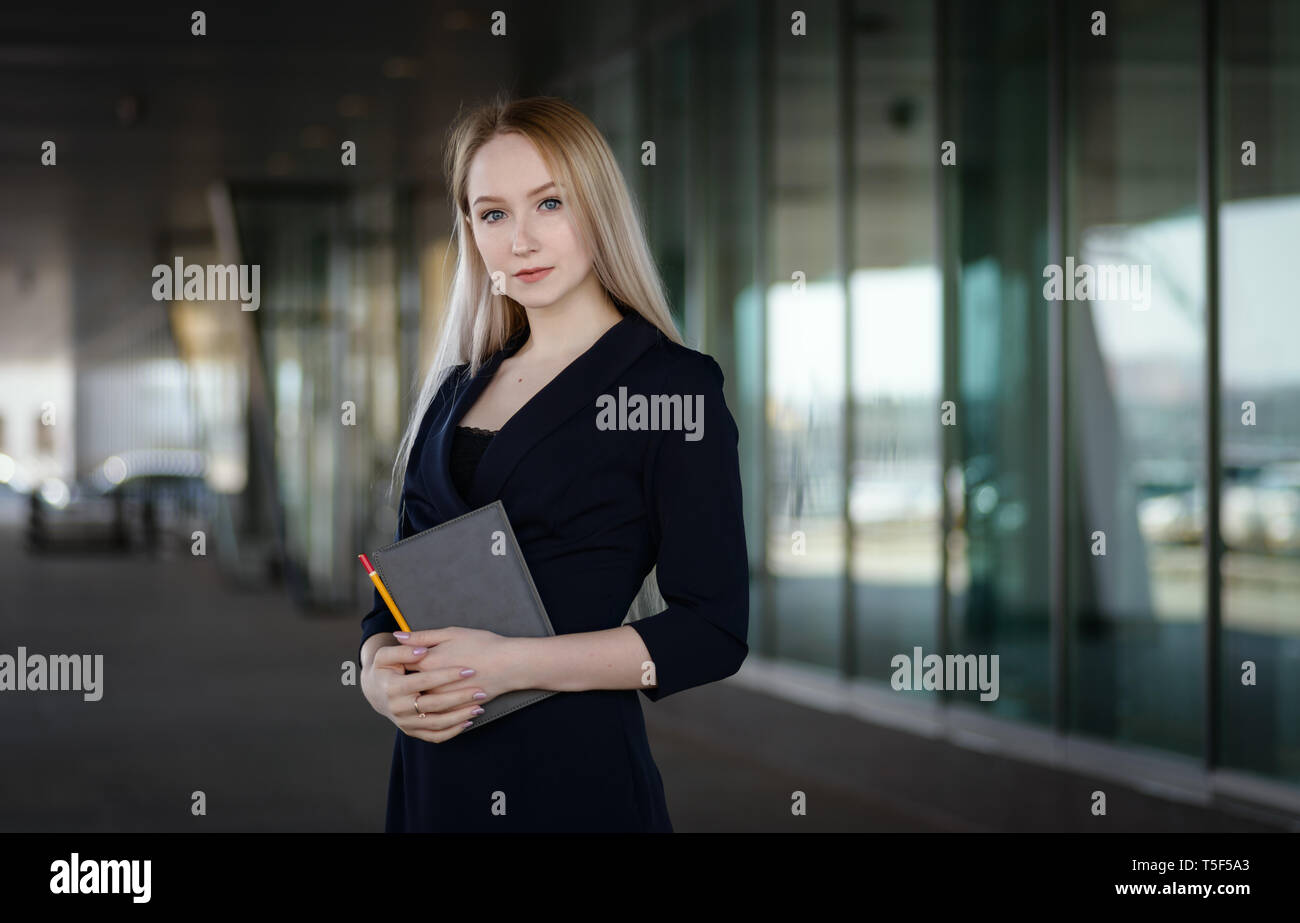 Hold notebook hi-res stock photography and images - Alamy
