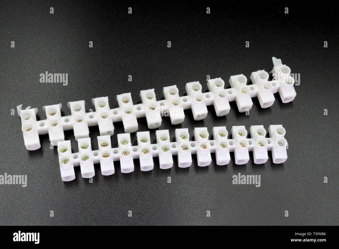 Electrical Cable Connectors isolated on black background.High ...