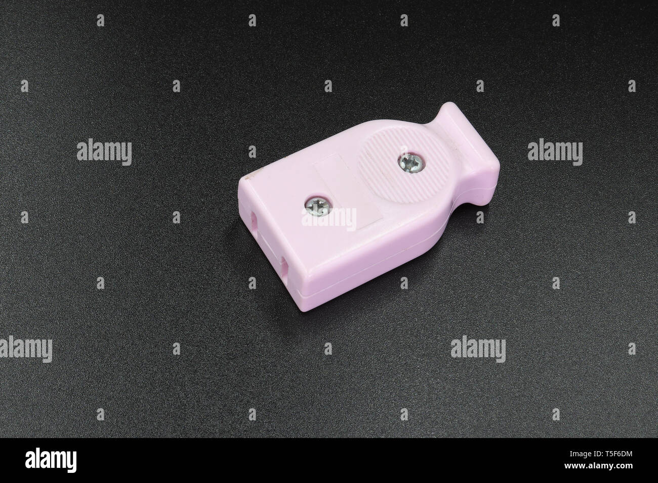 power plugs isolated on black studio background High resolution image ...