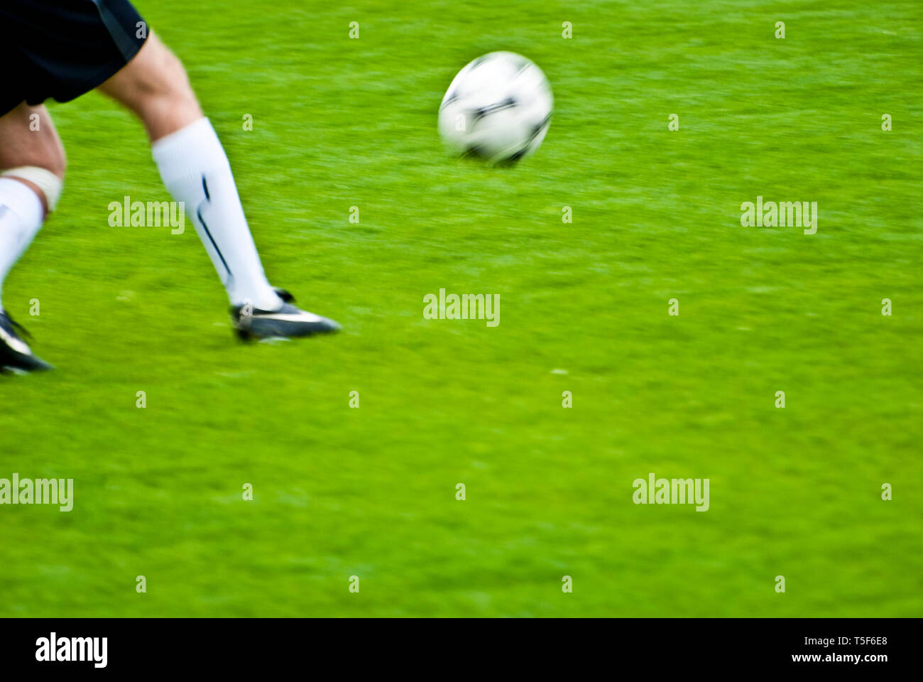 Legs of a soccer player hi-res stock photography and images - Alamy