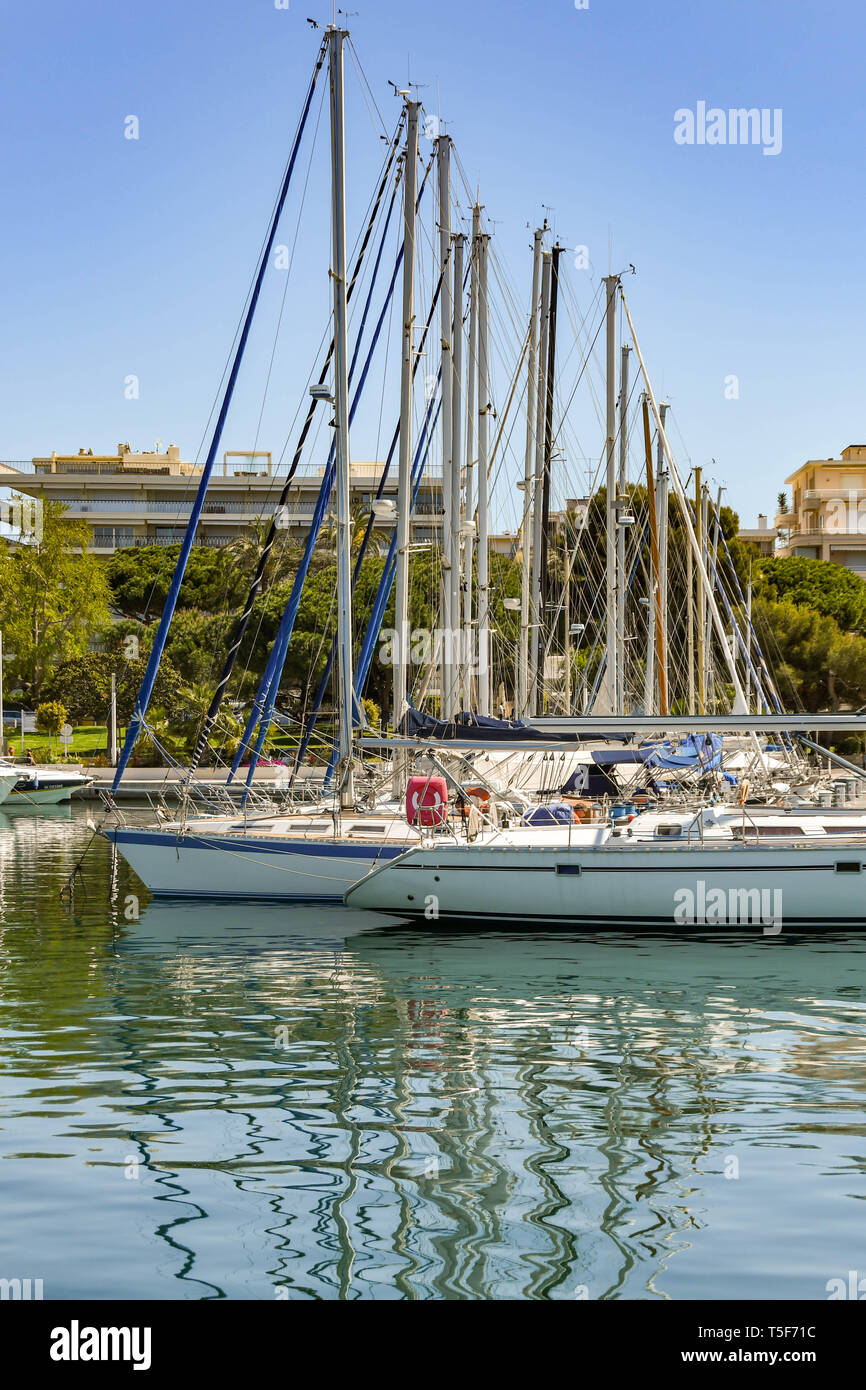 CANNES, FRANCE - APRIL 2019: Yachts lined up in the Port Pierre Canto ...