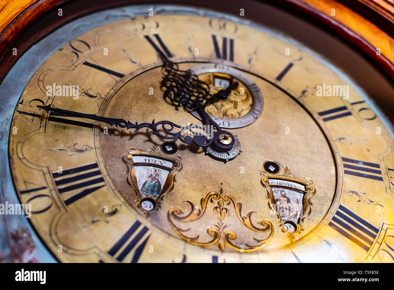 Beautiful retro and old ancient wall clock Stock Photo - Alamy