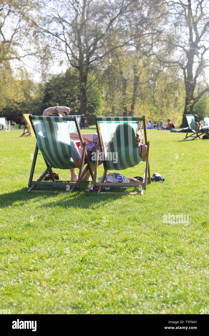 Relaxing in the spring sunshine in St James's Royal Park, in central ...