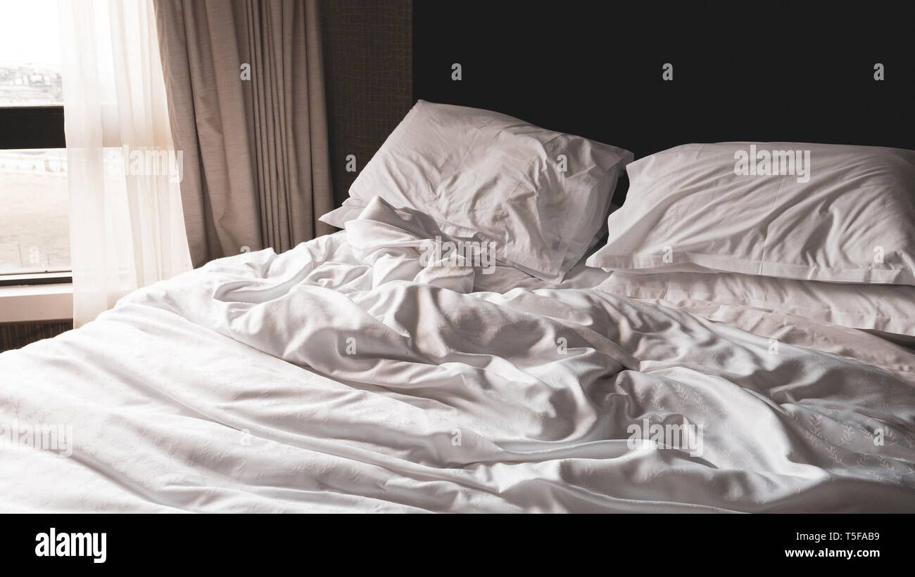 rumpled bed sheets in the morning Stock Photo - Alamy