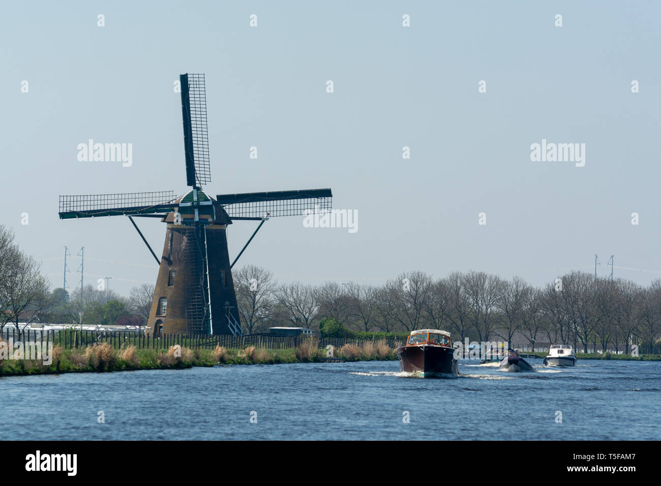 Waterways and canals in North Holland with boats and view on ...