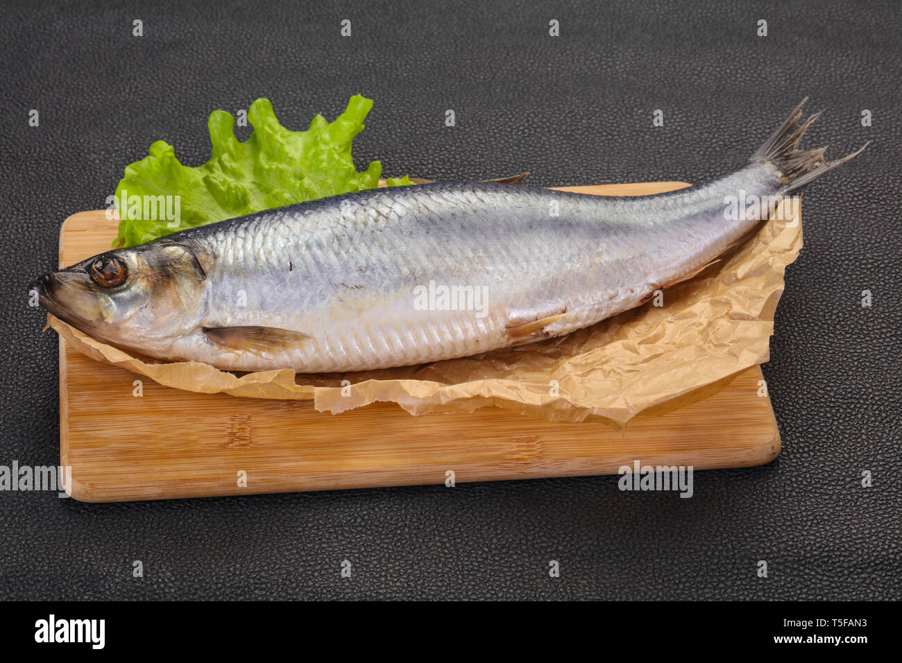 Salted herring fish ready for eat Stock Photo - Alamy