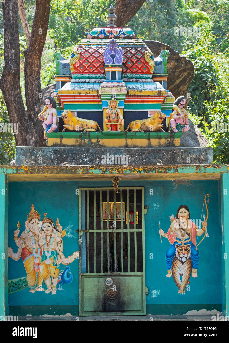 A roadside Hindu shrine near Pollachi in Tamil Nadu, India. Shrines to ...