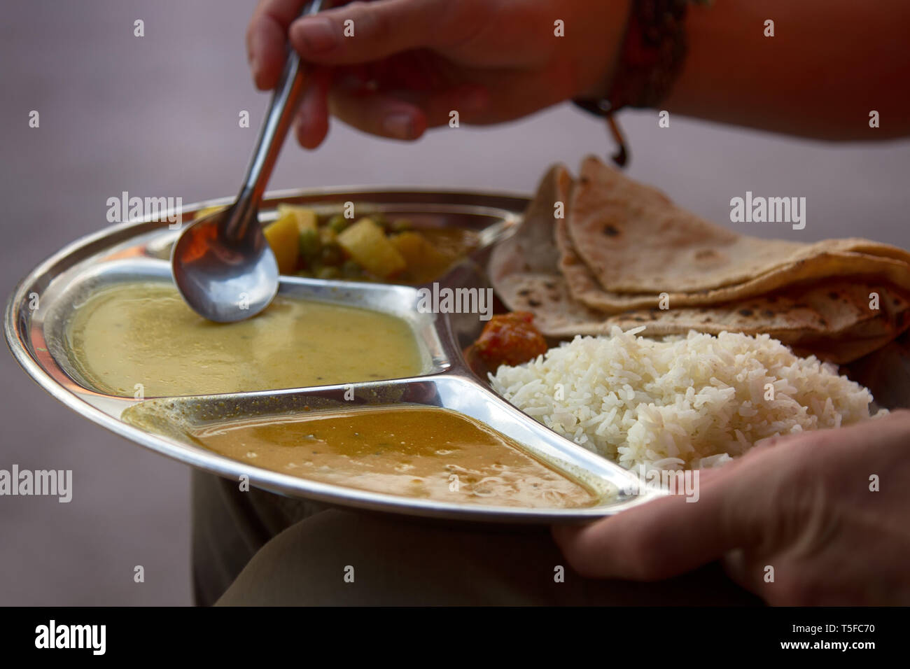 Indian woman cooking breakfast hi-res stock photography and images - Alamy
